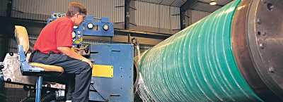 Roll grinding procedures, wheels, belts, setup, end relief, tips