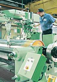 Roll grinding procedures, wheels, belts, setup, end relief, tips
