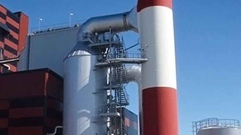 Wet flue gas cleaning and heat recovery