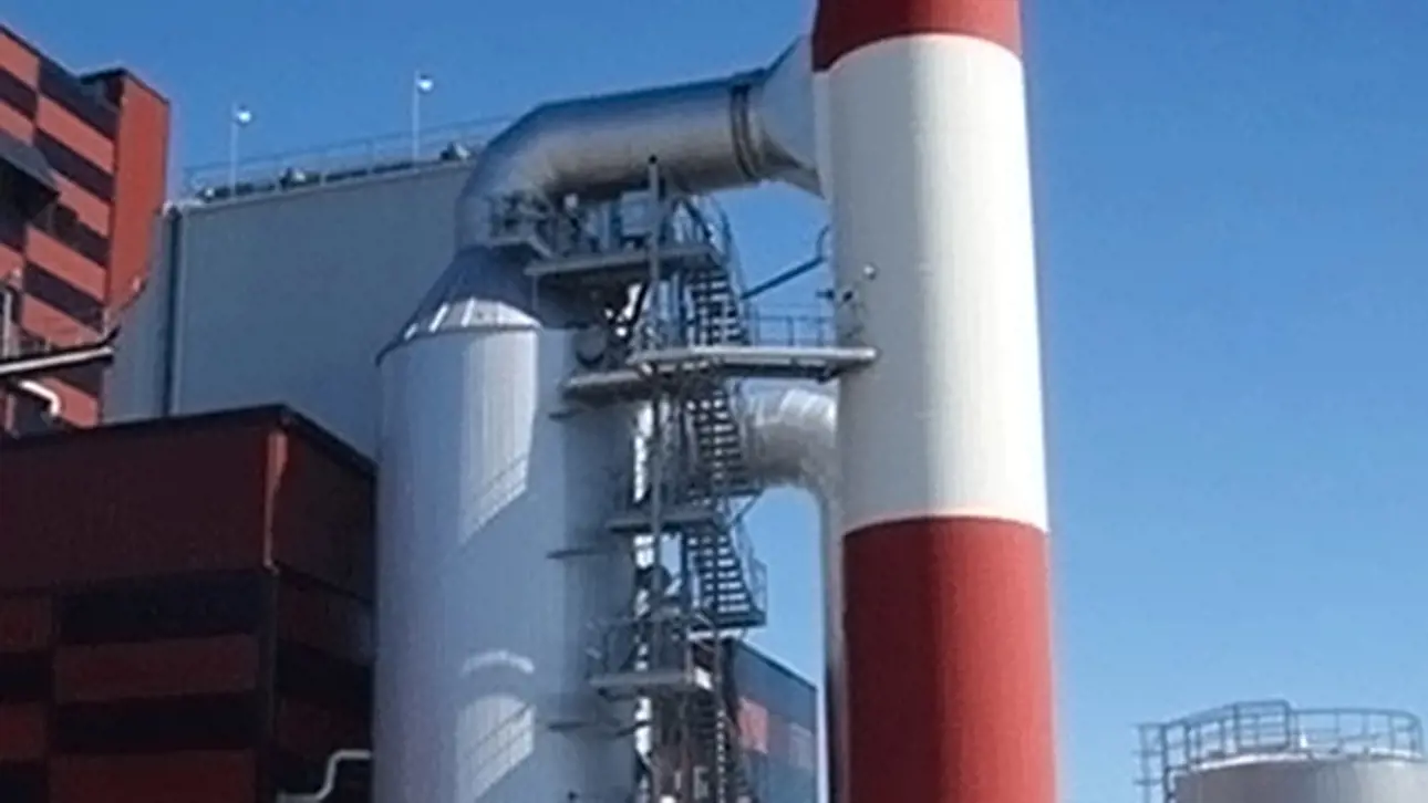 Wet flue gas cleaning and heat recovery